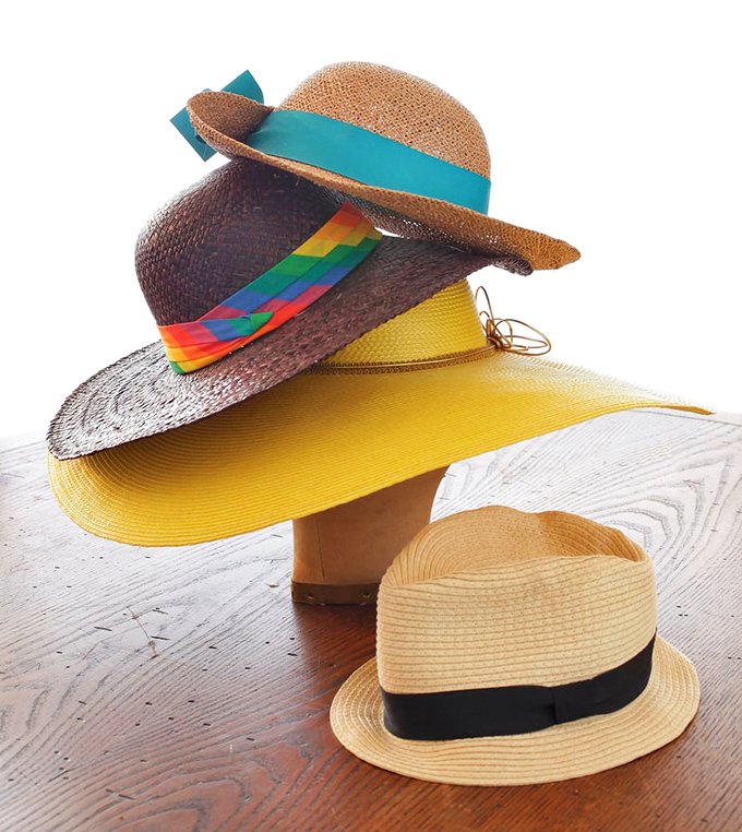 Hat heaven for sun-soaked adventures! From fedoras to wide-brims, these toppers prove second-hand style is always first-rate.