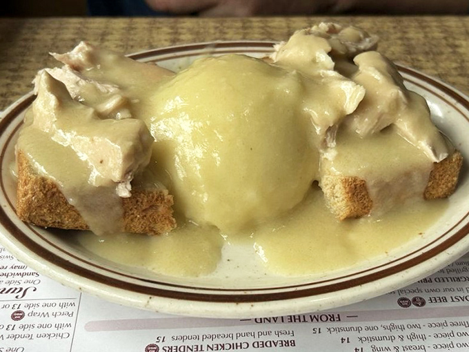 Hot turkey sandwich that bridges the gap between Thanksgiving and everyday life. Comfort food engineering at its most brilliant.