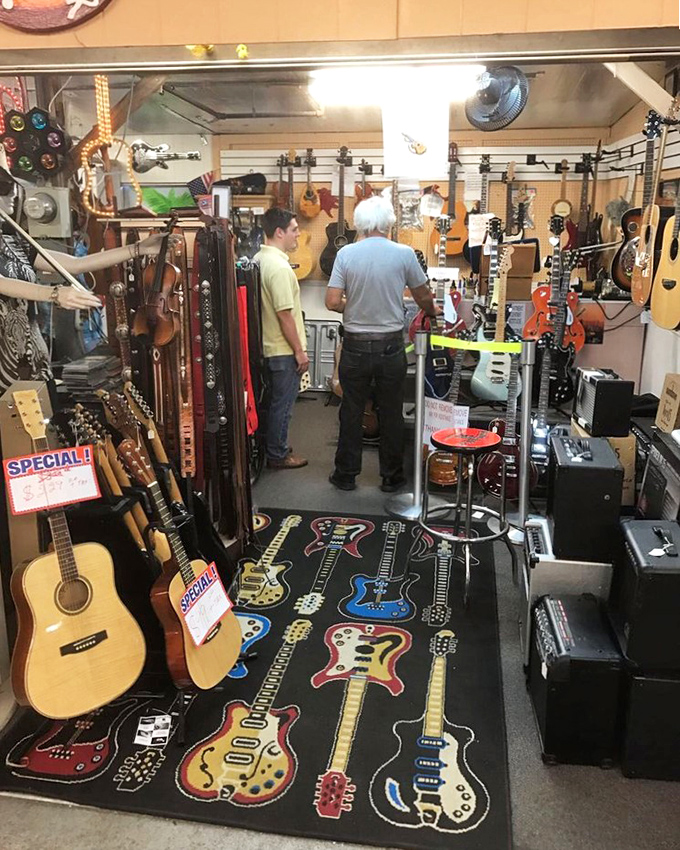 Guitar heaven for musicians and dreamers alike. That floor mat is the closest most of us will get to a rock star's stage.