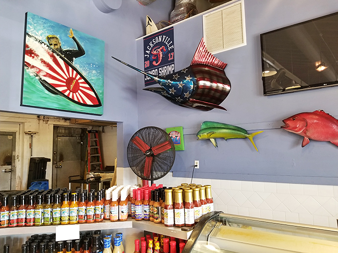 The walls tell stories of maritime adventures while bottles of hot sauce stand at attention. This isn't decoration&mdash;it's a seafood shrine.
