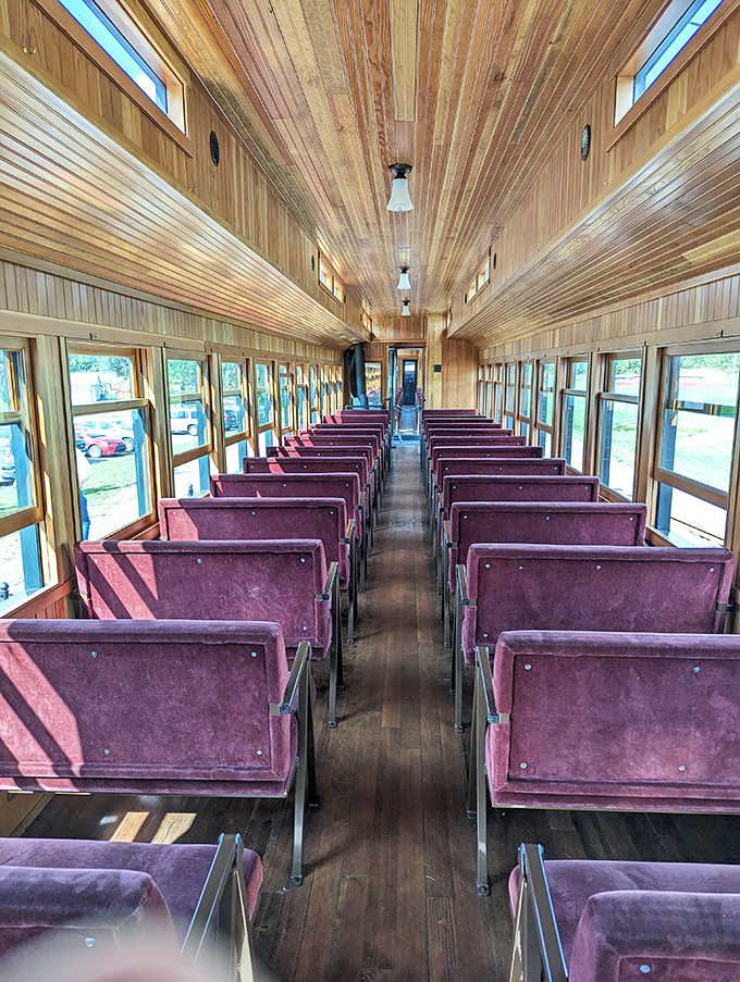 Wooden ceilings and plush purple seats create a passenger experience from another time. First-class travel before "economy" was invented.