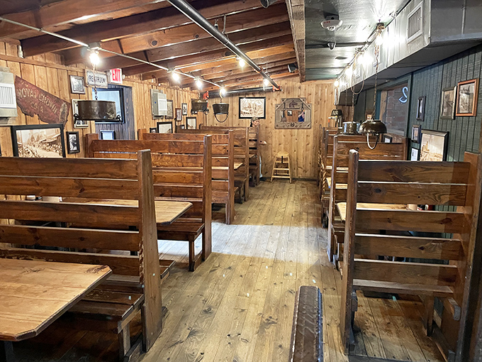 Wooden booths worn smooth by thousands of satisfied customers. These seats have witnessed countless barbecue epiphanies.