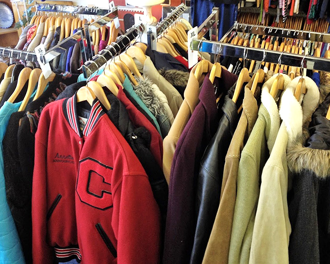 Vintage letterman jackets and fur-trimmed coats hang together like old friends reminiscing about the glory days of fashion.