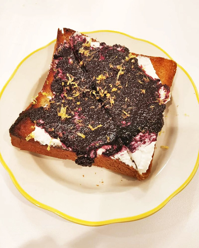 Toast elevated to art form&mdash;thick-cut bread becomes the canvas for a vibrant jam creation that transforms breakfast into a celebration.