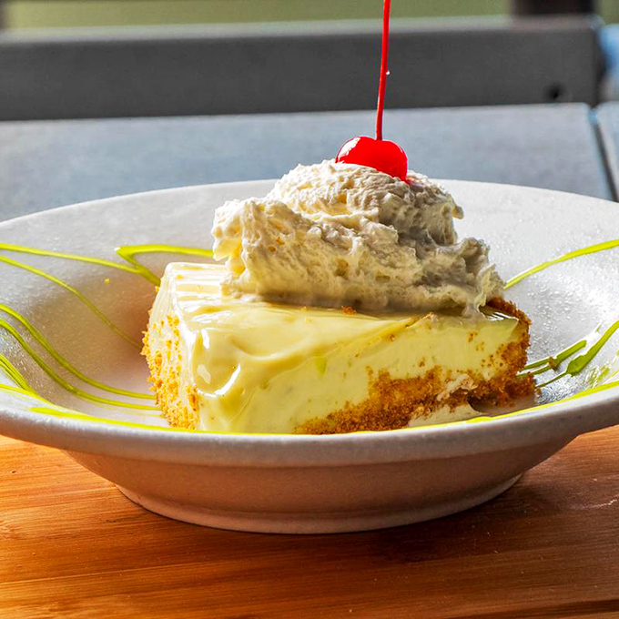 The star of the show: key lime pie that strikes the perfect balance between tart and sweet, topped with whipped cream and a cherry that's basically showing off.