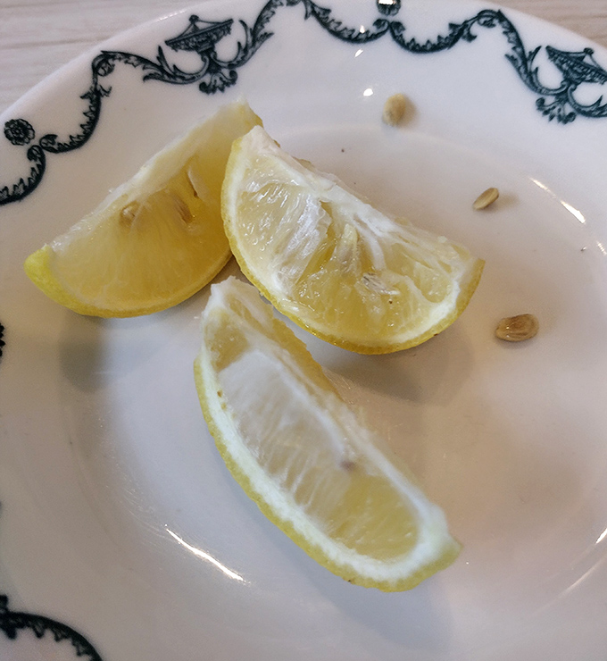 These lemon wedges aren't just garnish&mdash;they're the finishing touch that brightens seafood dishes and iced tea alike, a small but crucial detail.