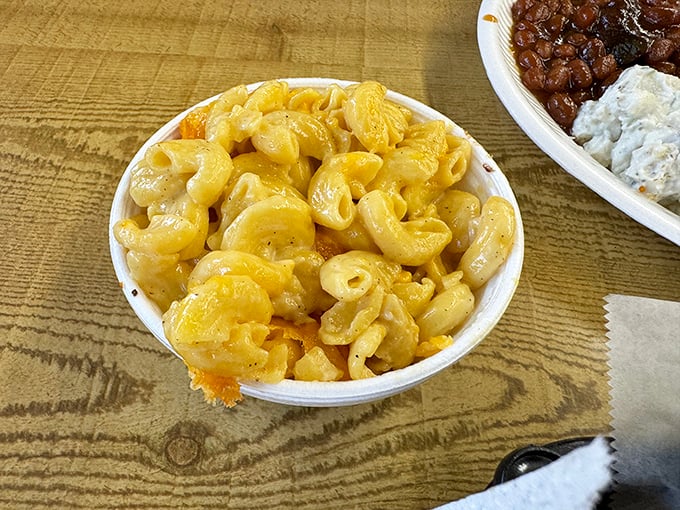Mac and cheese so good it deserves its own area code. This isn't the blue box stuff&mdash;it's a cheese-pull paradise worthy of your stretchy pants.
