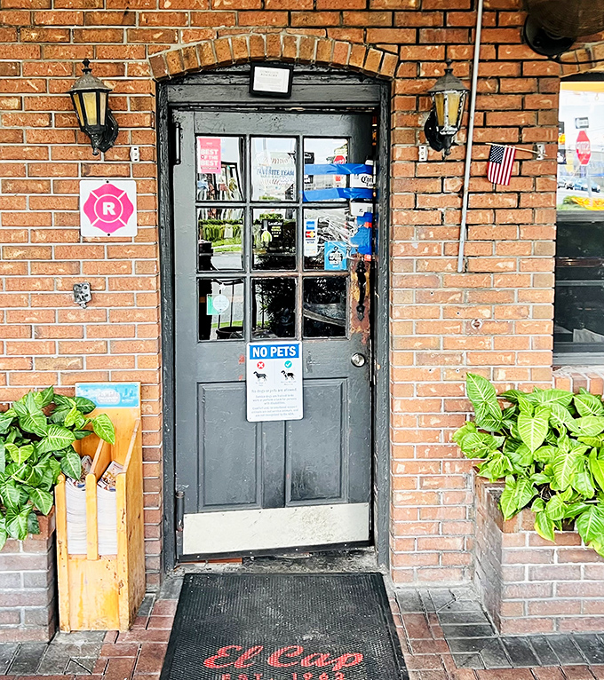 A weathered door that's welcomed generations of burger enthusiasts. The first step to happiness is often across a humble threshold.