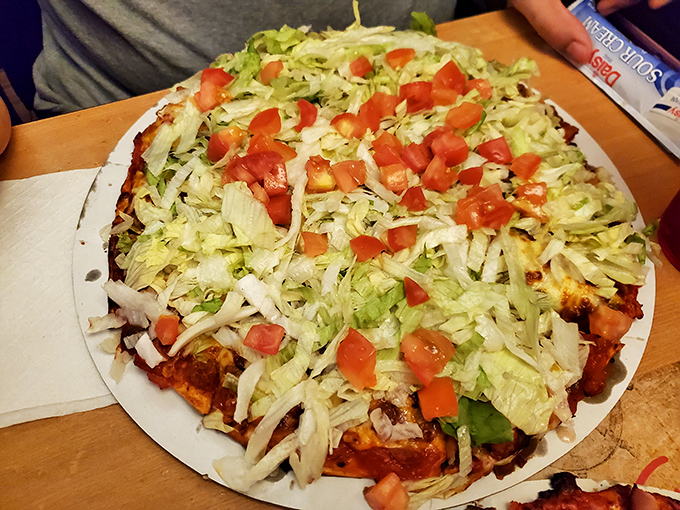The Mexican pizza brings south-of-the-border flair with fresh lettuce and tomatoes creating a fiesta of textures that somehow makes perfect sense on a pizza.