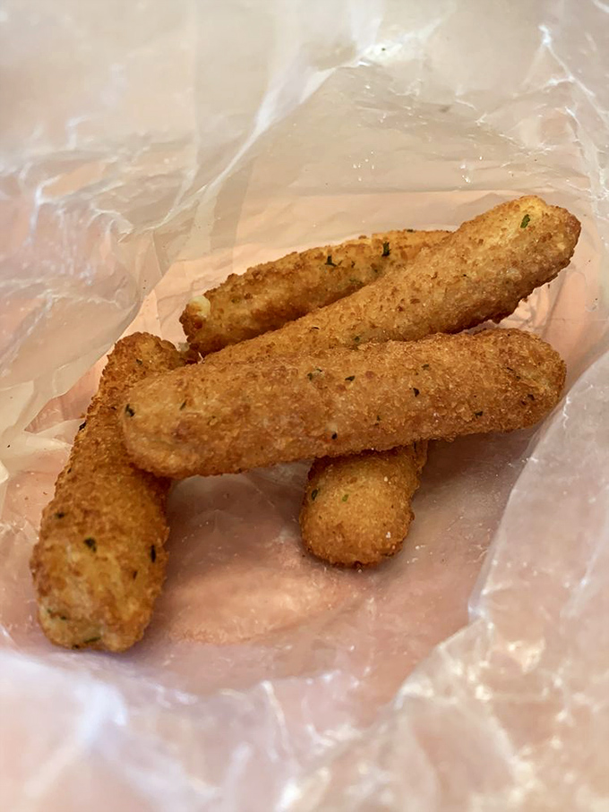 Mozzarella sticks with that perfect golden crunch giving way to molten cheese. The kind of simple pleasure that makes Monday feel like Friday.