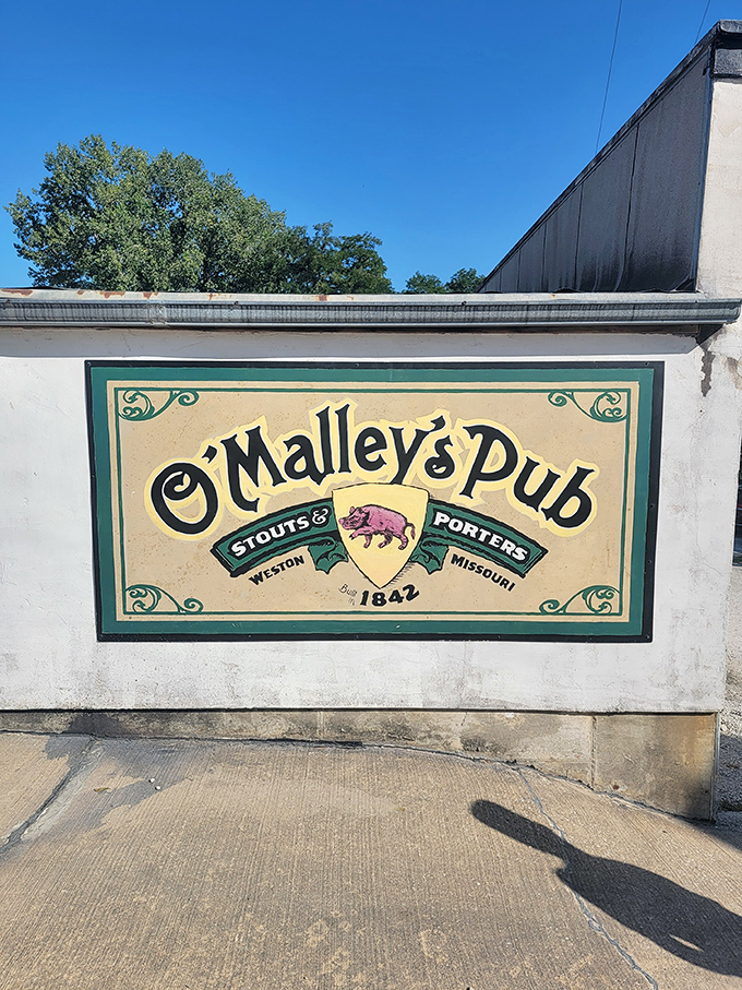 A sign that promises exactly what it delivers. That pink pig knows you're about to enjoy some seriously good food and drink.