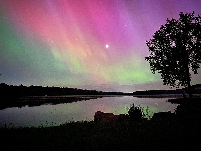 The northern lights putting on a cosmic light show over Kiser Lake. Nature's version of Vegas, minus the slot machines.