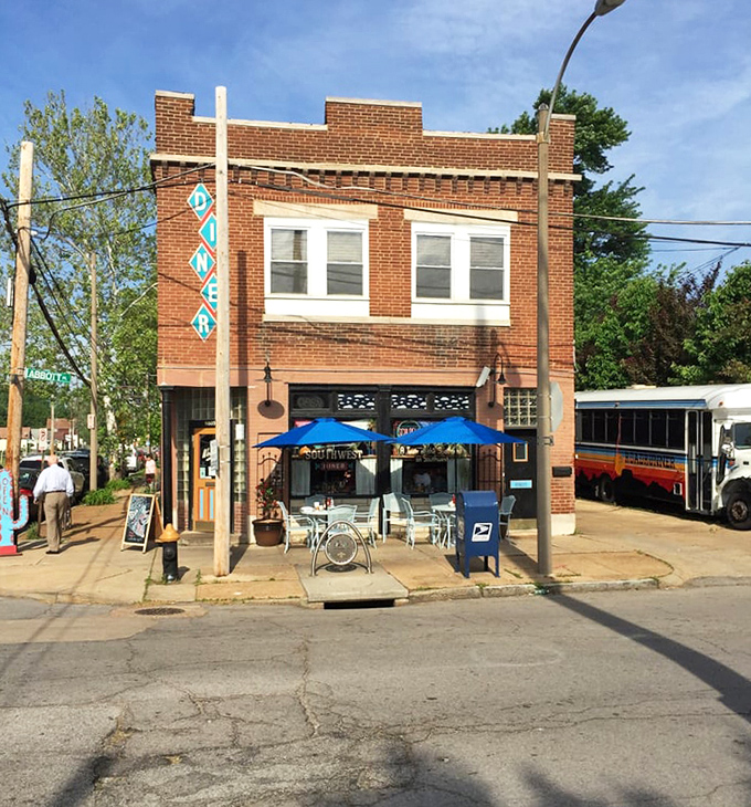 The classic brick building stands proudly on its corner, with outdoor seating for those rare perfect Missouri days when the weather cooperates.
