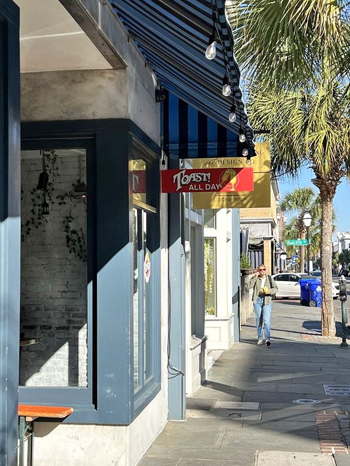 Charleston's palm trees stand guard outside, as if nature itself is waiting in line for those famous biscuits and gravy.
