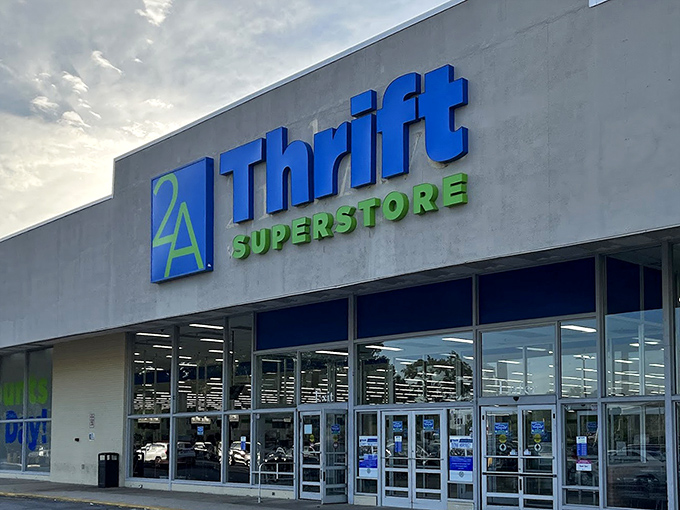 As dusk approaches, the 2nd Ave sign glows like a lighthouse guiding bargain hunters safely to shore after a day of retail adventures.