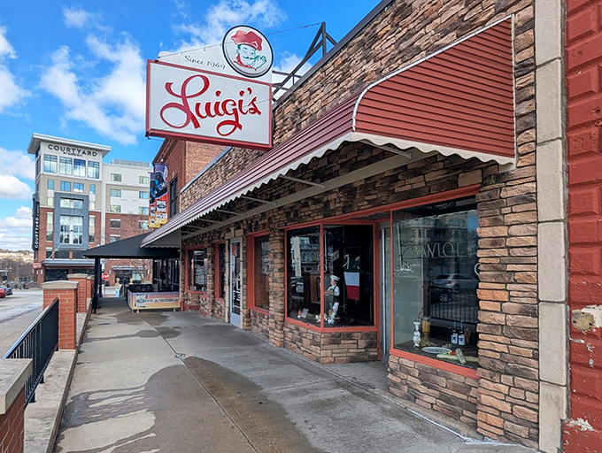 Luigi's exterior view shows how it stands proudly amid modern development&mdash;a delicious time capsule holding its ground in downtown Akron.