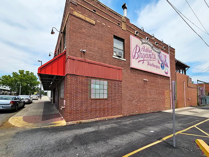 The side view reveals no frills, just facts: this humble brick building houses barbecue greatness that's stood the test of time.