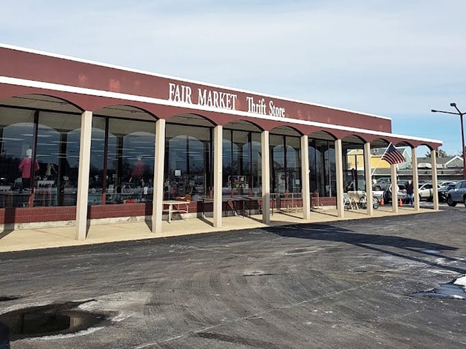 The exterior view showcases the impressive scale of this thrifter's paradise. That burgundy awning has welcomed countless bargain hunters through the years.
