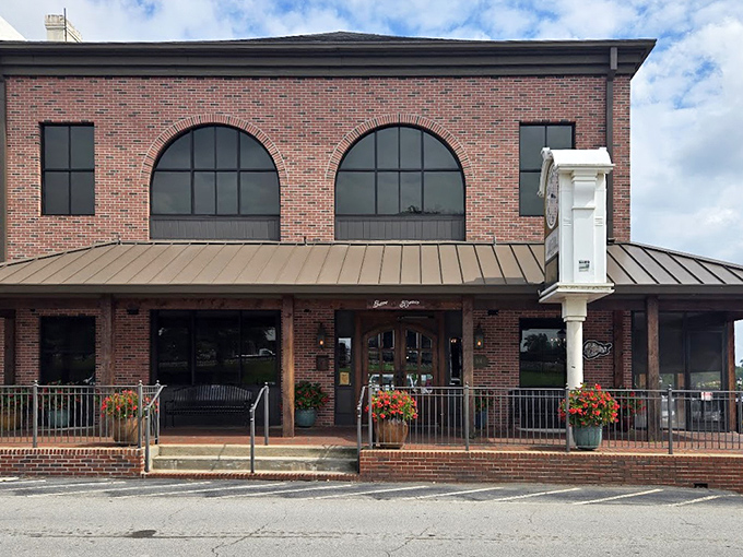 Brick, metal, and glass come together in architectural harmony, creating a restaurant exterior that honors Buford's past while serving up modern culinary delights.