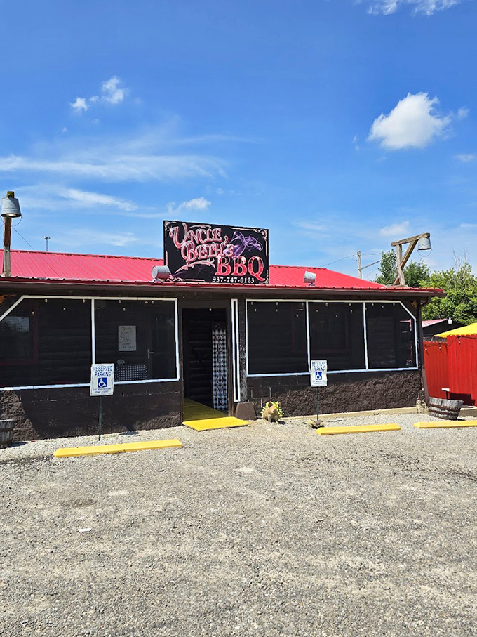 Blue skies above a red roof &ndash; nature's perfect backdrop for the serious business of barbecue that happens within these humble walls.