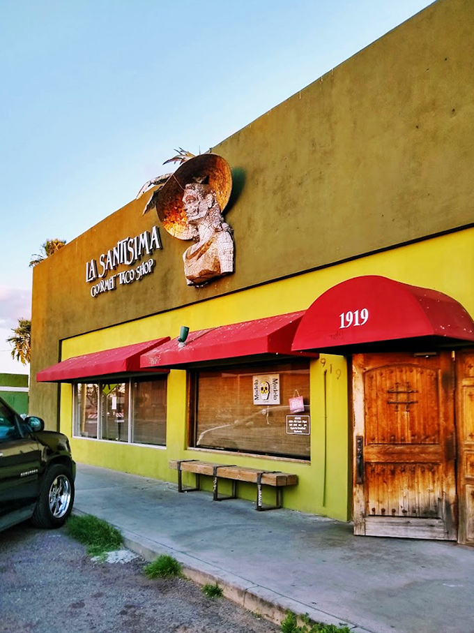 The welcoming entrance with its wooden door and bench invites you to slow down and prepare your taste buds for the journey ahead.