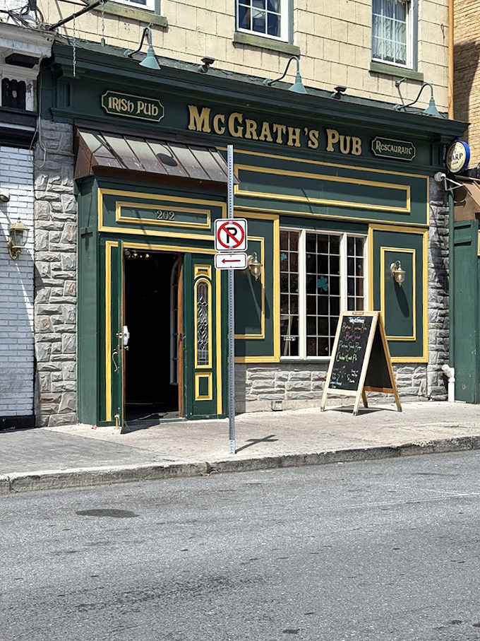 The classic Irish pub exterior with its stone foundation and green trim promises authentic experiences before you even step inside.