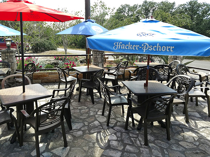 The outdoor patio where Hacker-Pschorr umbrellas provide shade while you contemplate how something as simple as a burger can achieve such greatness.