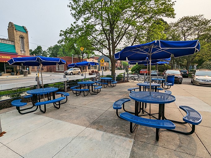Outdoor seating with matching blue umbrellas—because sometimes you need your meatloaf with a side of fresh Wisconsin air.