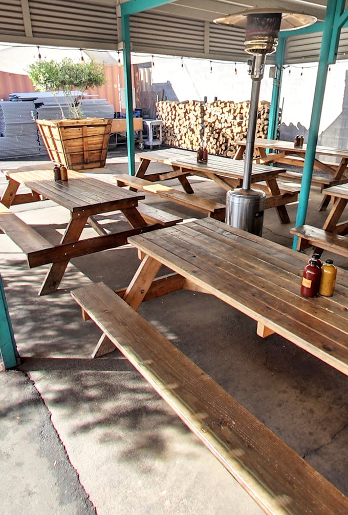 Outdoor picnic tables create the perfect setting for messy, joyful feasting. Under Arizona skies, with sauce on your fingers, barbecue achieves its highest purpose.