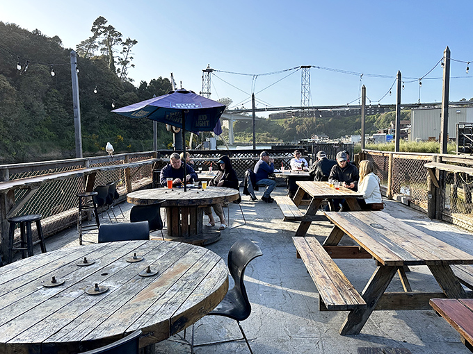 Weathered wood tables with a view of the harbor&mdash;where every meal comes with a side of California coastal magic.
