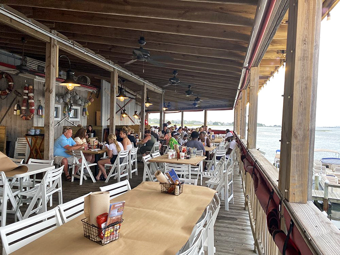 The waterfront patio offers views almost as delicious as the food. Because somehow, crabs taste even better when you can see where they came from.