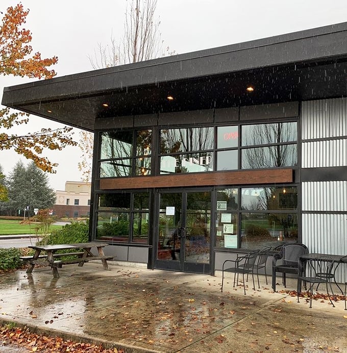 Even in Oregon rain, The Diner's patio beckons with its simple charm. Some places just look more inviting when slightly damp, like a cozy sweater for buildings.
