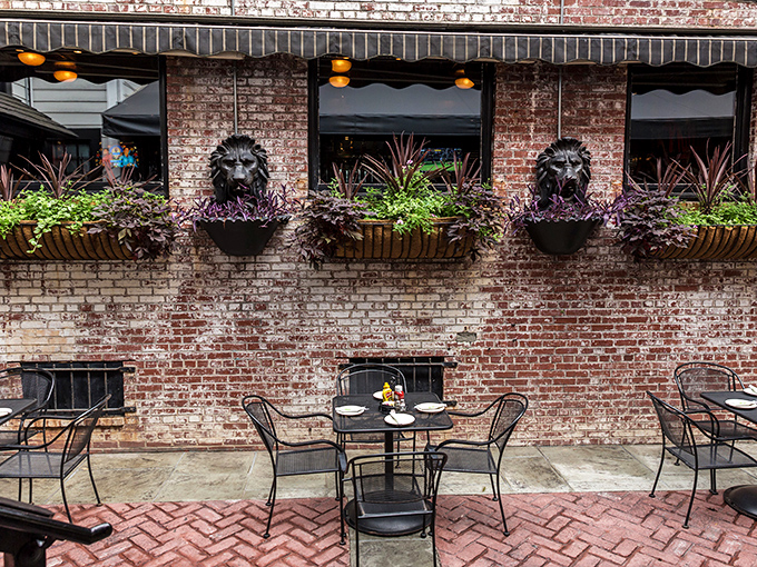 The outdoor seating area, with its wrought iron furniture and brick walls, offers a European-inspired respite from the Pennsylvania summer heat.