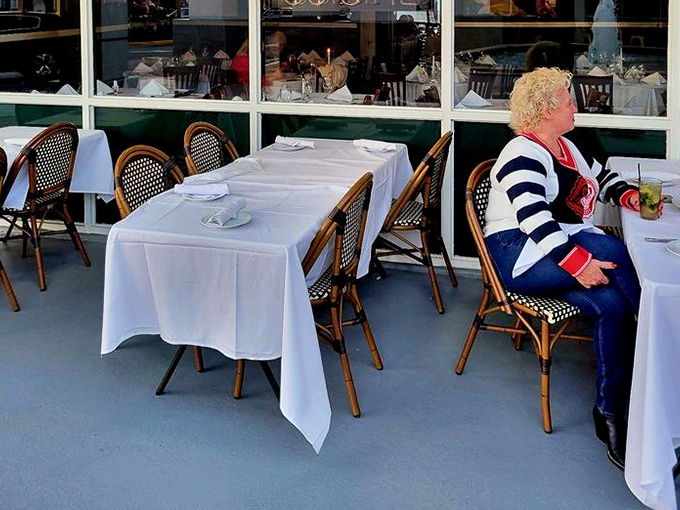 Outdoor dining with crisp white tablecloths where you can people-watch while the Florida breeze reminds you why you live here (or wish you did).