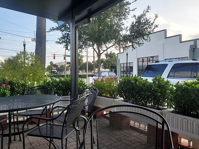 The outdoor seating area offers a peaceful retreat for enjoying your coffee, watching Winter Haven wake up while planning your next breakfast adventure.