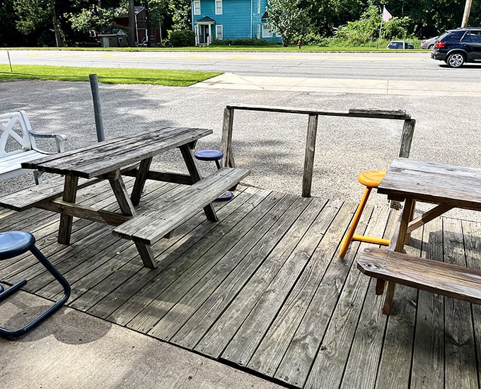 Weather-worn picnic tables on the deck aren't just seating&mdash;they're community gathering spots where strangers become neighbors over shared meals and Ohio small talk.