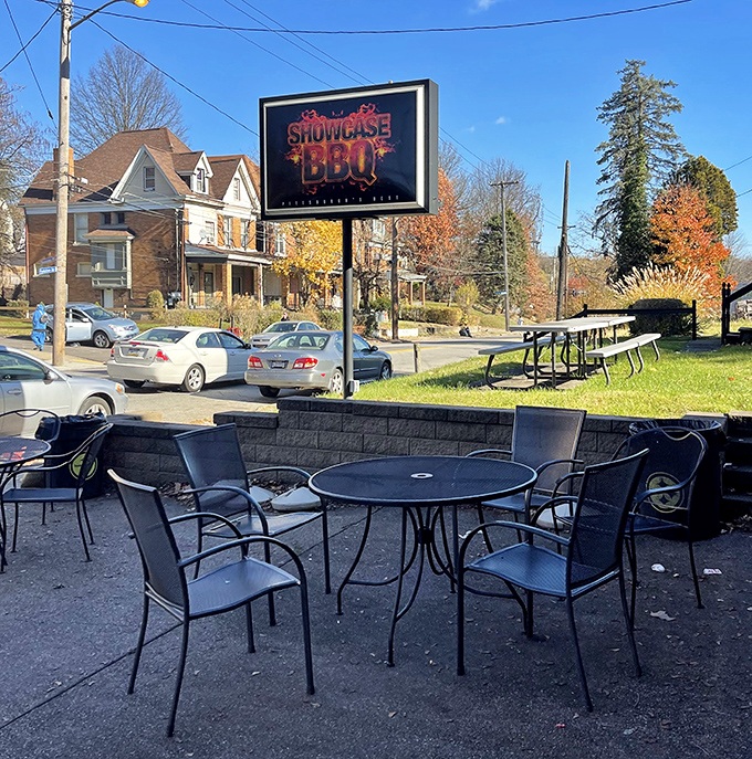 The outdoor seating area offers a front-row view of Homewood. On pleasant days, these tables become Pittsburgh's most coveted dining spots.