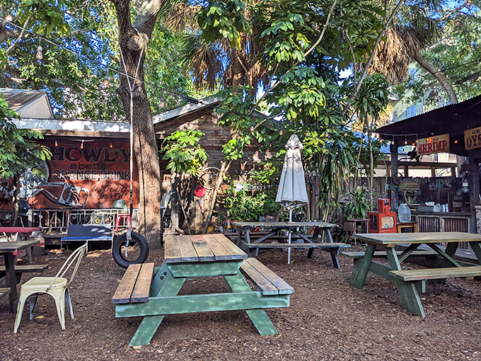 Picnic tables under palm trees create the perfect setting for making memories over meals that taste like vacation.