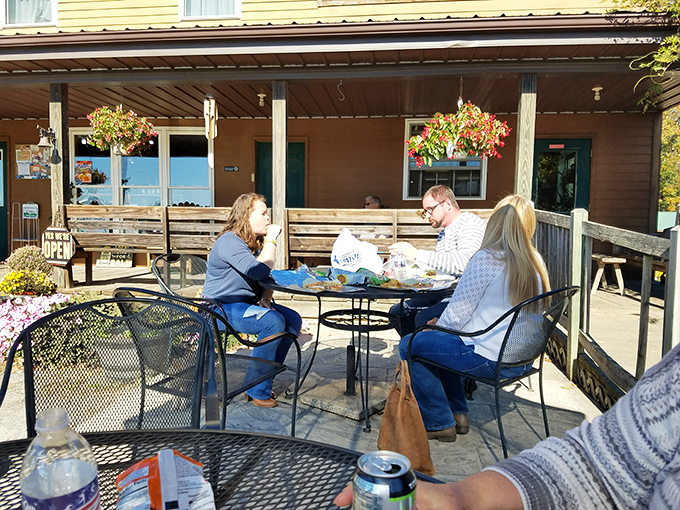 The outdoor seating area&mdash;where strangers become friends over exceptional sandwiches and the shared joy of a culinary discovery.
