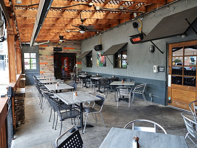 The outdoor patio at Wheat Penny&mdash;where string lights, wooden beams, and comfortable seating invite you to linger over one more glass of wine.