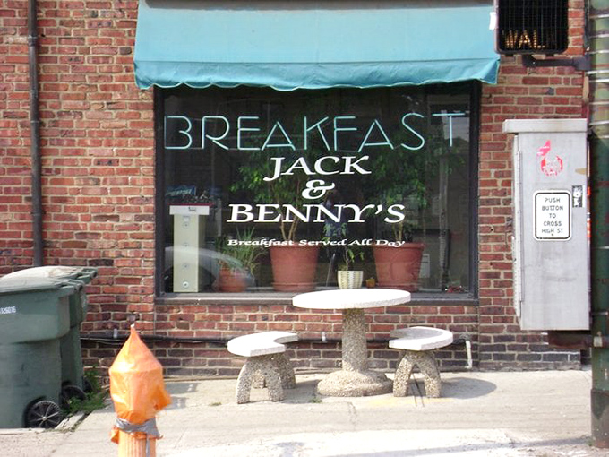 Sidewalk seating for the optimistic Ohio breakfast lover. When the weather cooperates, these concrete mushroom tables become prime real estate.