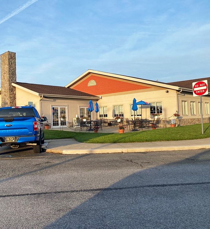 Outdoor seating for those rare moments when you want fresh air with your comfort food. Blue umbrellas provide shade for serious eating.