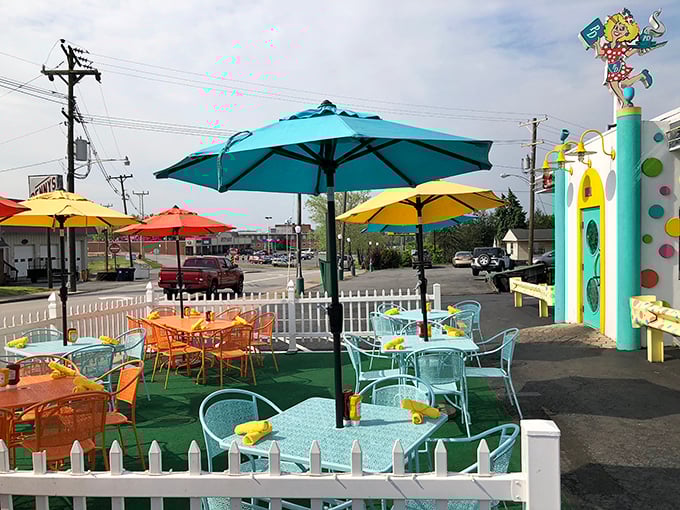 The outdoor seating area pops with colorful umbrellas and cheerful furniture. Like your most stylish friend's patio&mdash;if that friend had an unlimited budget and a love for Skittles. 