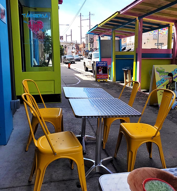 Yellow chairs that match the sunshine in your soul after that first perfect bite of guacamole. Outdoor seating for optimal taco enjoyment.