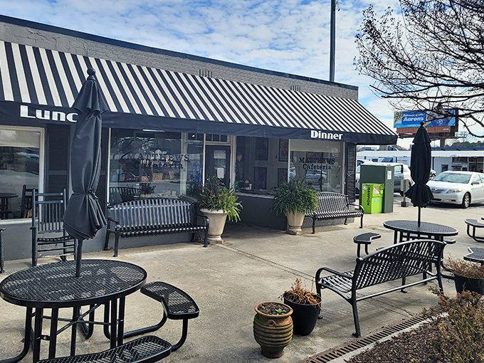 The outdoor seating area offers a moment of reflection before diving into comfort food that will have you planning your next visit before you've finished the first.