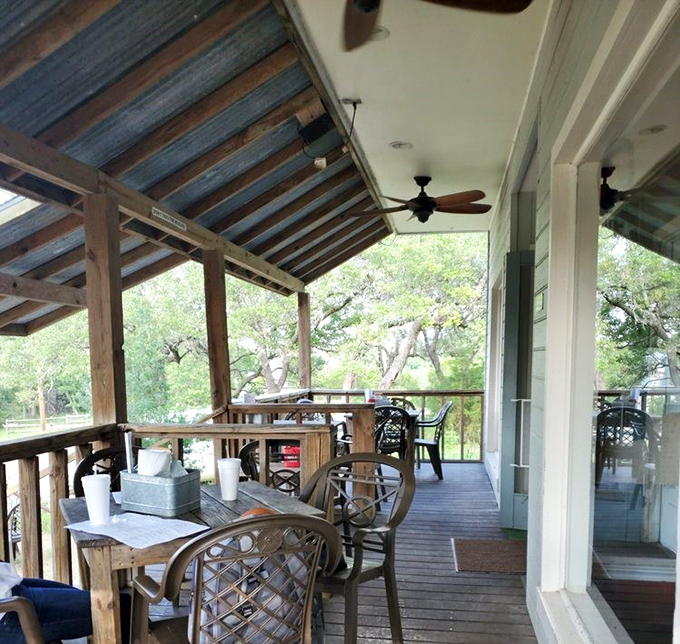 The outdoor porch &ndash; where Hill Country breezes enhance every bite. Nature's dining room with a view that pairs perfectly with cold beer.