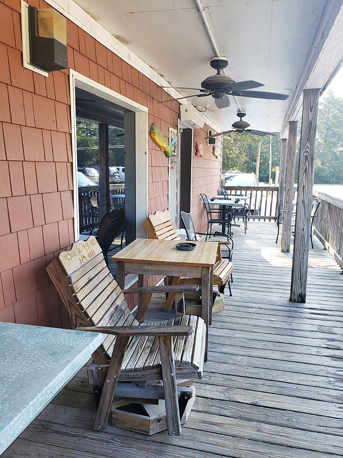 The front porch &ndash; where waiting for a table becomes part of the experience, and wooden benches have heard decades of "you should've seen the size of the crab I caught" stories.