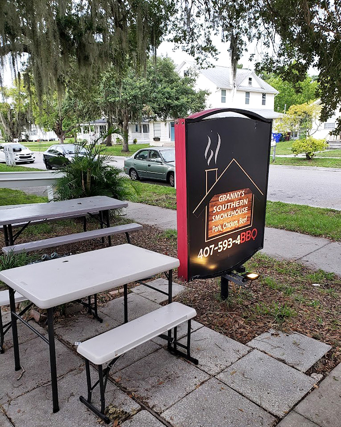Spanish moss hanging from trees frames the entrance like nature's welcome banner. In Florida, even the trees dress up for good BBQ.