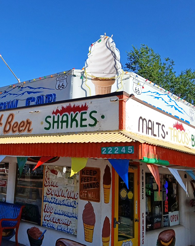 The Snow Cap's exterior promises three essential road trip food groups&mdash;shakes, malts, and tacos&mdash;under one gloriously kitschy roof.