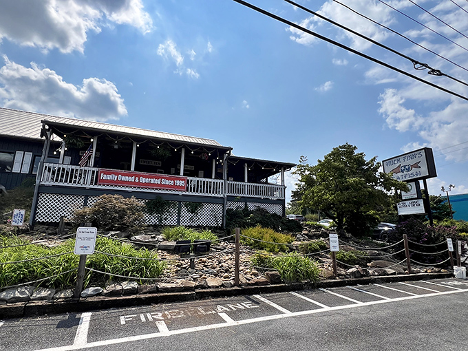 Perched on a small hill with its "Family Owned" sign proudly displayed, Huck Finn's stands as a delicious rebellion against chain restaurant mediocrity.